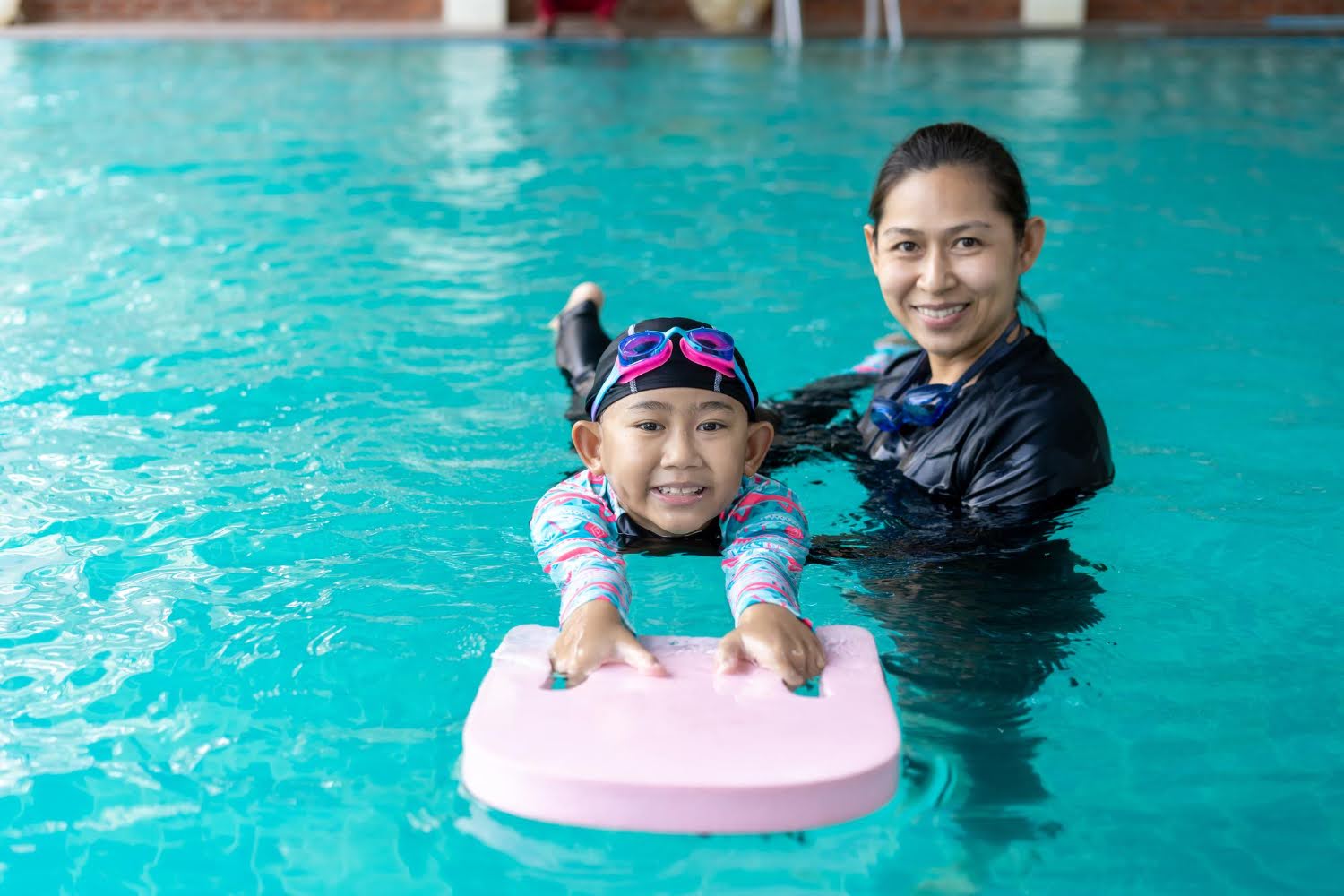 When To Start Swimming Lessons & What Parents Should Know