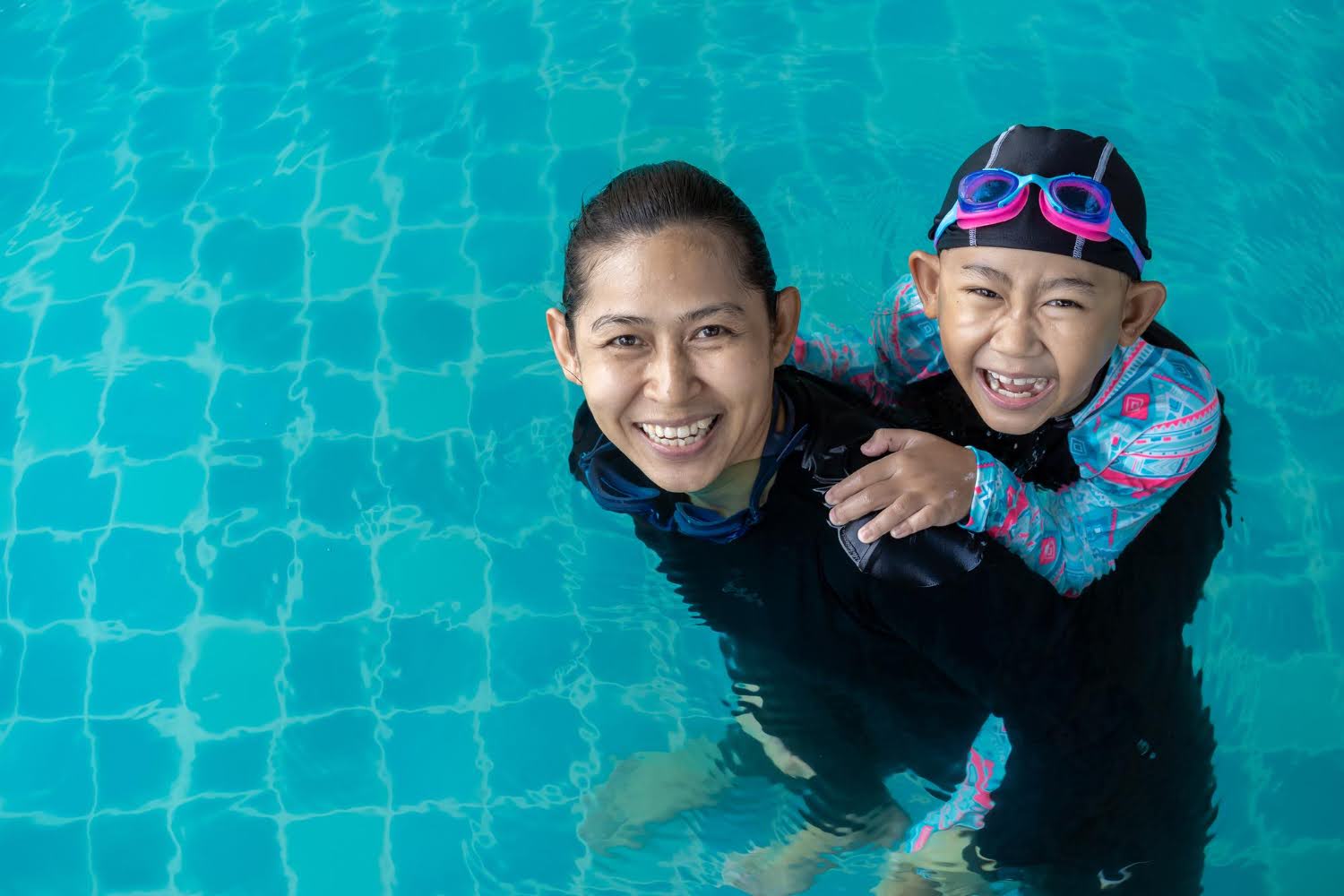 A Step-by-Step Guide On How To Teach Your Kids To Swim